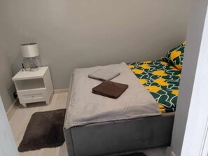 Suíte família, vista para a cidade | Ferros/tábuas de passar roupa, Wi-Fi de cortesia