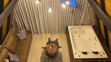 Chalé Deluxe | Banheira de hidromassagem privativa