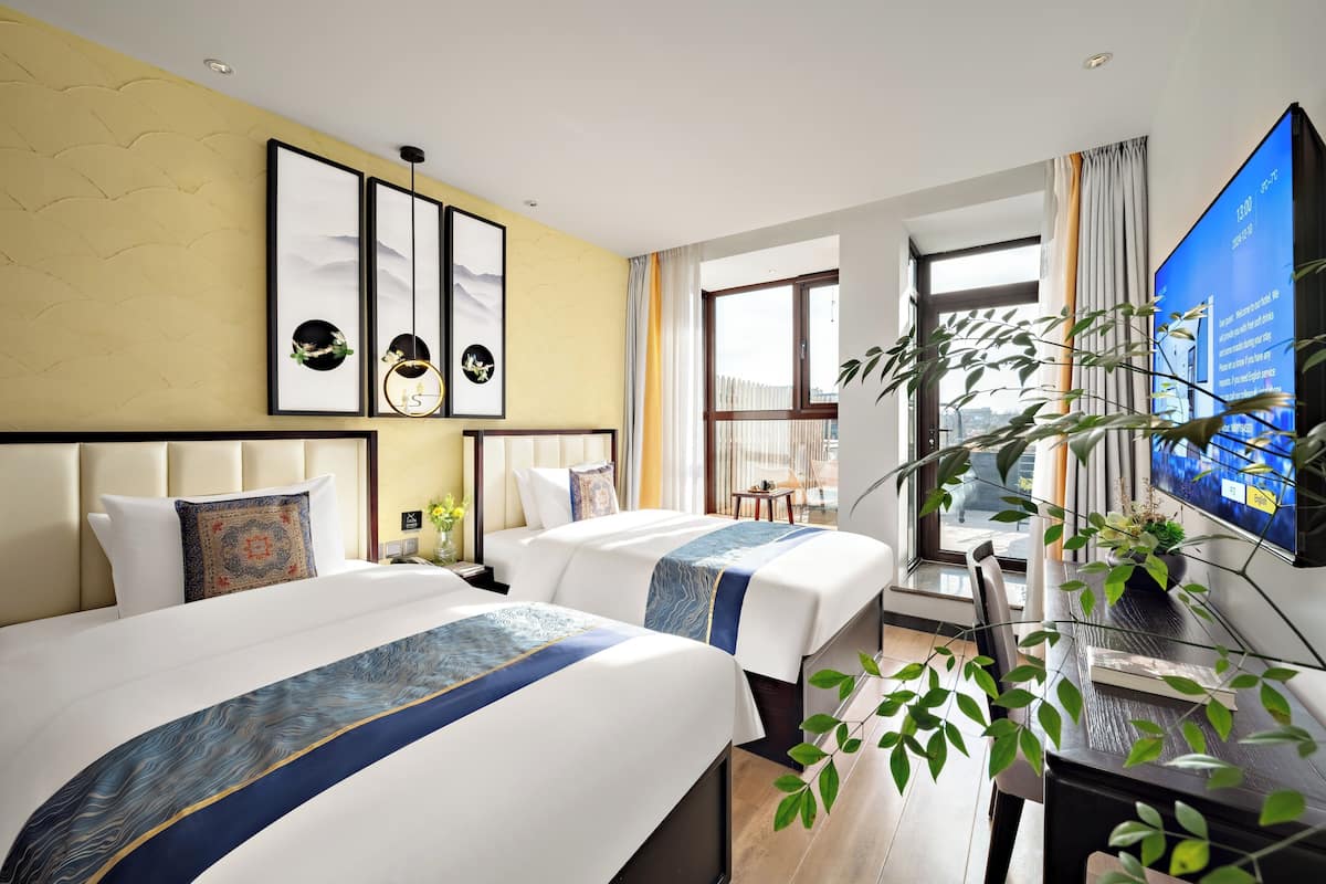 Quarto Panorâmico | Roupa de alta qualidade, edredões de penas, minibar grátis