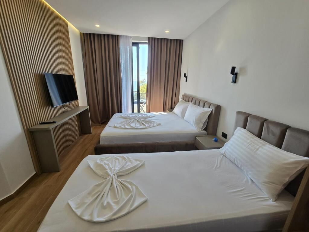 Quarto triplo, vista para o mar | Wi-Fi de cortesia