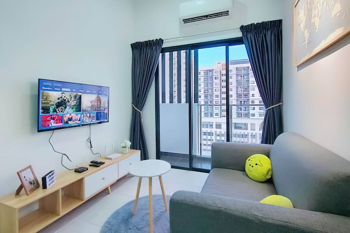 Apartamento Superior, 1 quarto, varanda, Vista para a cidade | Sala de estar | Televisor