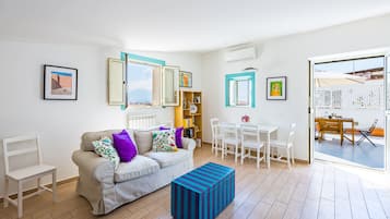Apartamento | Sala de estar | Televisor