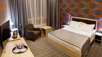 Quarto casal superior | Roupas de cama premium, frigobar, cofres nos quartos, escrivaninha