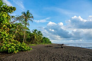 Na praia, toalhas de praia 