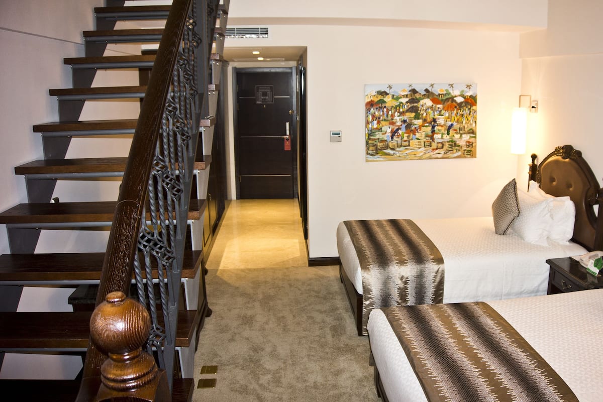 Duplex família | Roupas de cama premium, frigobar, cofres nos quartos, escrivaninha