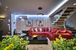 Duplex presidencial, 2 quartos (suite) | Sala de estar | TV LCD 35 polegadas com canais a cabo, TV, console de videogame