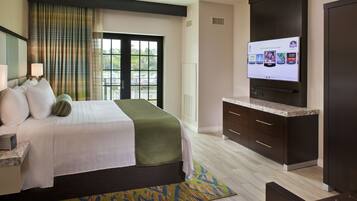 Suite, 1 cama king-size, varanda | Cofre no quarto, secretária, ferro/tábua de engomar