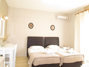 Apartamento | Cofres nos quartos, Wi-Fi de cortesia, roupa de cama