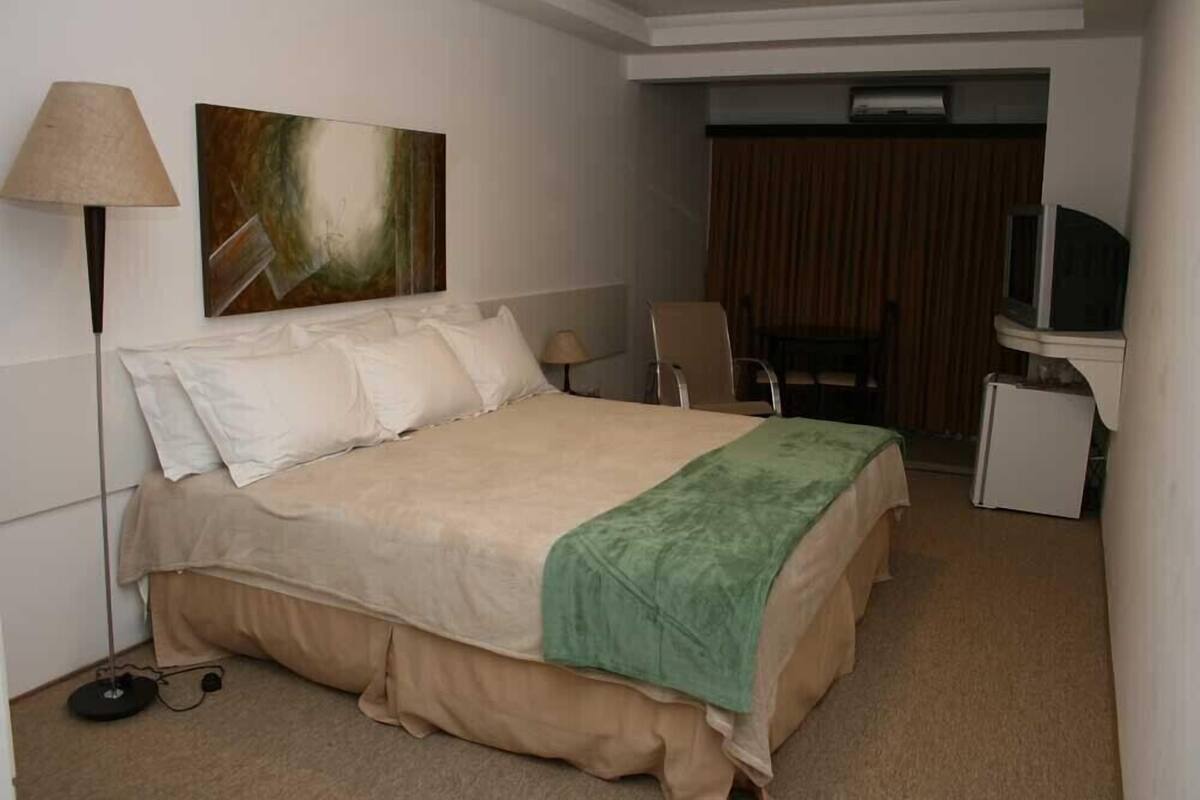 Quarto quádruplo standard | Frigobar, escrivaninha, cortinas blackout, berços grátis