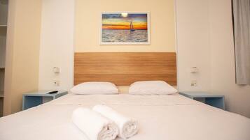 Apartamento Suite | Frigobar, escrivaninha, Wi-Fi de cortesia, roupa de cama
