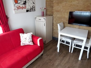 Apartamento luxo (1st Floor) | Sala de estar | TV