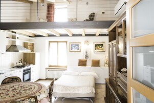 Apartamento conforto | Área de estar | TV de tela plana