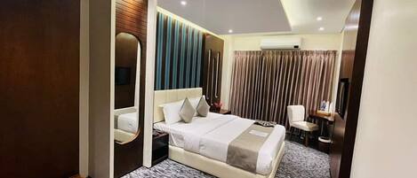 Quarto Duplo ou Twin Executivo | 1 quarto, cofre com capacidade para portátil, secretária