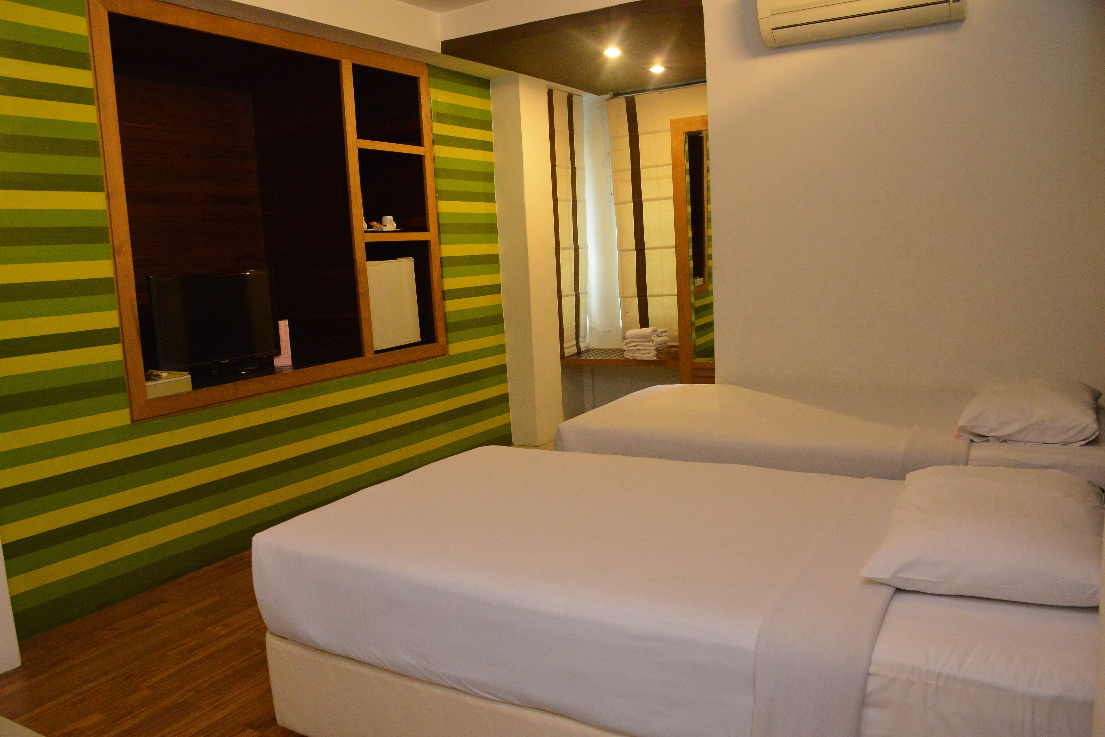 Minibar, camas desdobráveis, roupa de cama fornecida 