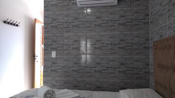 Minibar, quartos insonorizados, ferro/tábua de engomar