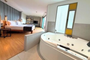 Suíte júnior | Frigobar, cofres nos quartos, escrivaninha, cortinas blackout