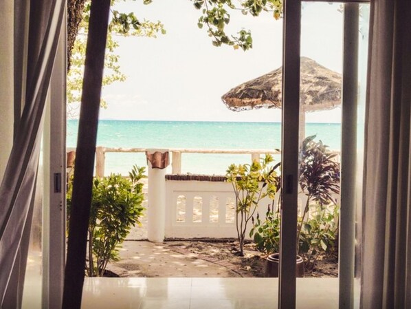 Quarto, de frente para a praia | Vista do quarto