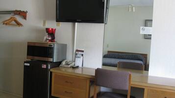 Cofres nos quartos, escrivaninha, camas extras/dobráveis (sobretaxa)