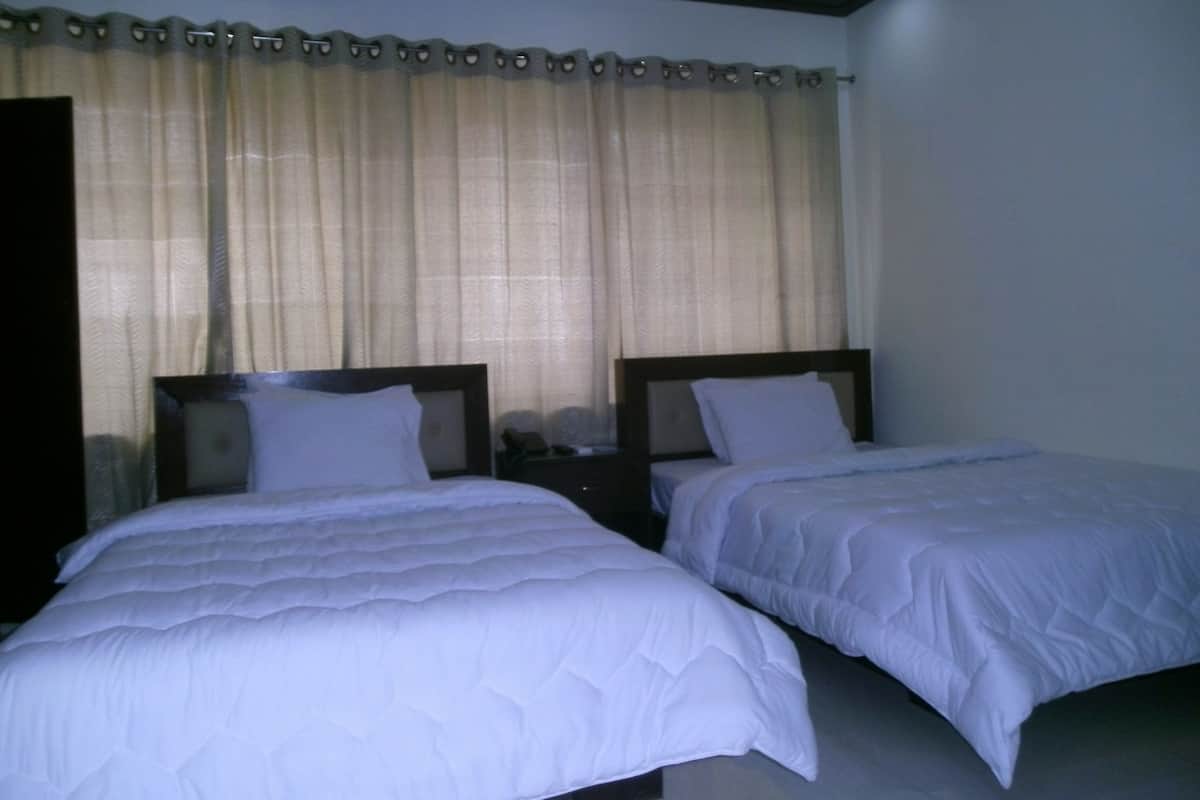 Quarto Twin Deluxe, 1 quarto | Cofre no quarto, Wi-fi grátis