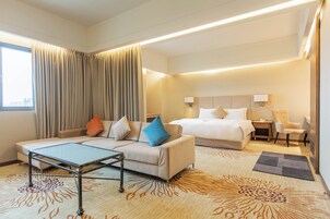 Suite Exclusiva, 1 cama king-size, não fumadores | 1 quarto, edredões de penas, minibar, secretária 