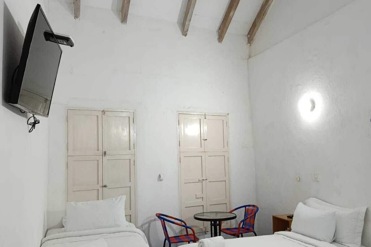 Quarto triplo | 1 quarto, cofres nos quartos, Wi-Fi de cortesia, roupa de cama