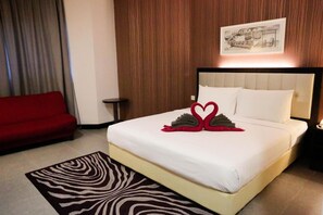 Quarto Duplo Deluxe | 1 quarto, minibar, cofre no quarto, secretária 