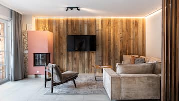 Apartamento Design, 4 quartos, varanda (Excl. 266 EUR cleaning fee) | Sala de estar | TV de ecrã plano