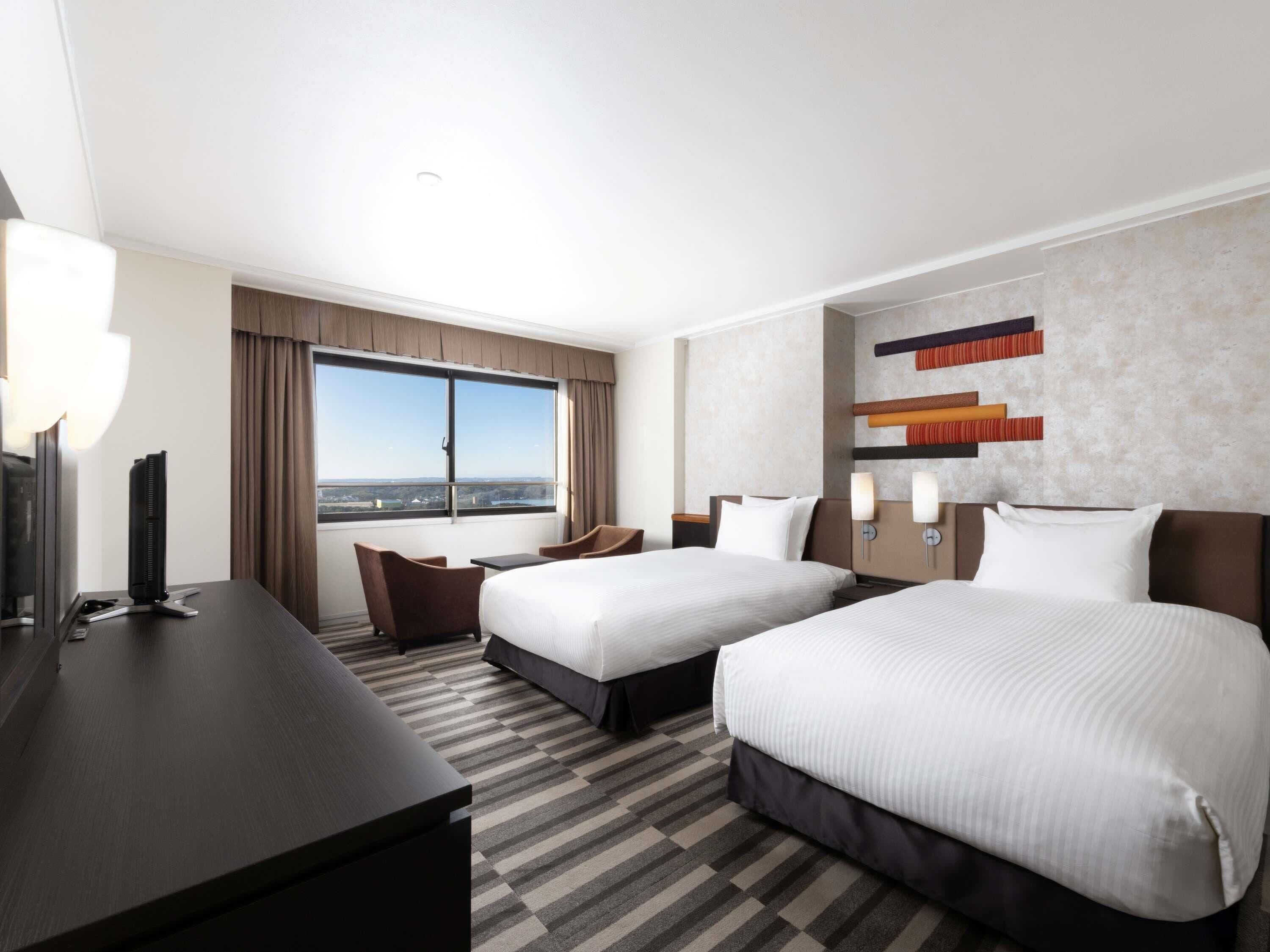 Suite Deluxe, várias camas, vista para o mar | Cofre no quarto, cortinas/cortinados opacos, Wi-fi grátis 