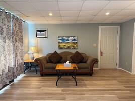 Apartamento Básico | Sala de estar | Televisor 