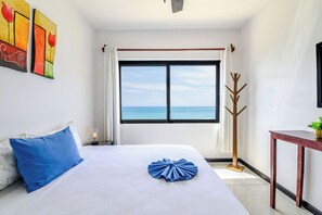 Apartamento, 2 quartos, vista para o oceano | 1 quarto, roupas de cama premium, cofres nos quartos, escrivaninha