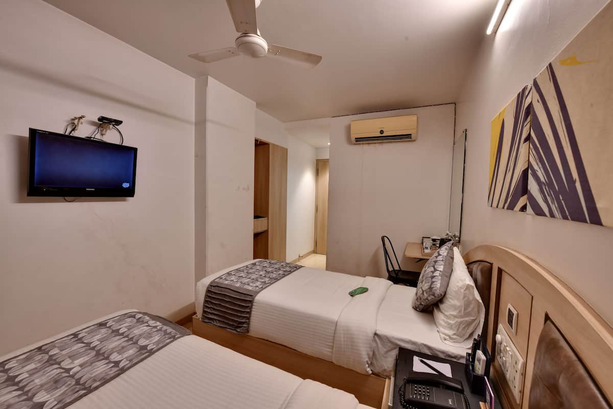 Quarto luxo | Quartos à prova de som, Wi-Fi de cortesia, roupa de cama