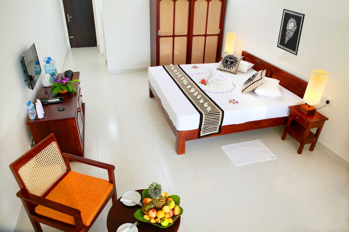 Quarto superior | Frigobar, cofres nos quartos, escrivaninha