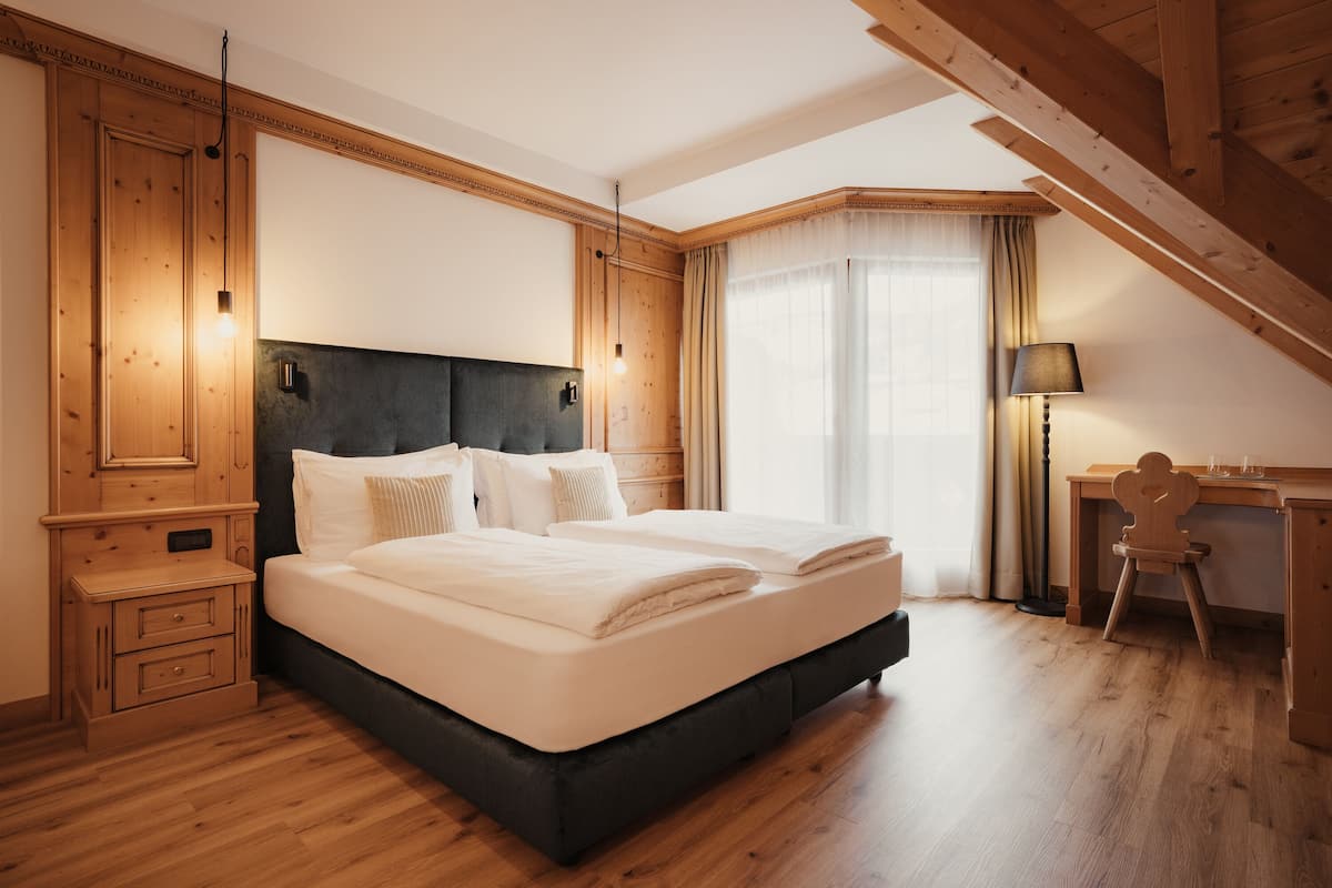 Suíte estúdio júnior | Roupas de cama premium, edredons de pluma, frigobar, cofres nos quartos