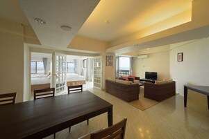 Suíte, para não fumantes, vista para o mar | Sala de estar