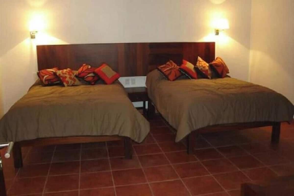 Roupas de cama premium, Wi-Fi de cortesia, roupa de cama