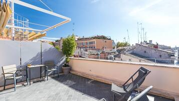 Suite Panorâmica, 1 cama king-size e sofá-cama, terraço, Vista para a cidade | Terraço/pátio interior
