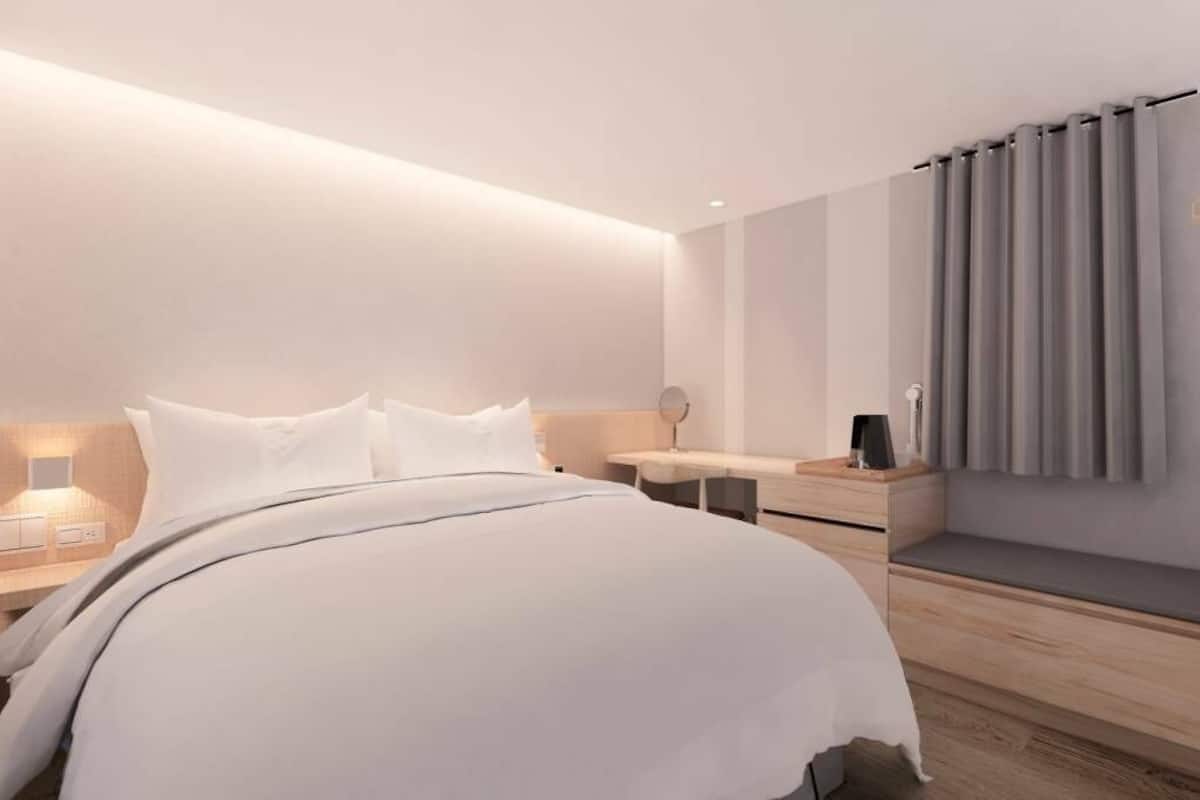 Quarto Económico | Com decoração personalizada, cortinas/cortinados opacos, Wi-fi grátis