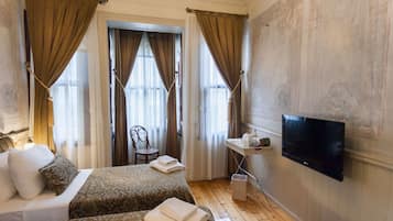 Suíte | 1 quarto, frigobar, ferros/tábuas de passar roupa, Wi-Fi de cortesia