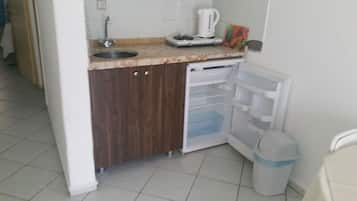 Apartamento Standard, varanda, vista para a piscina | Sala de estar