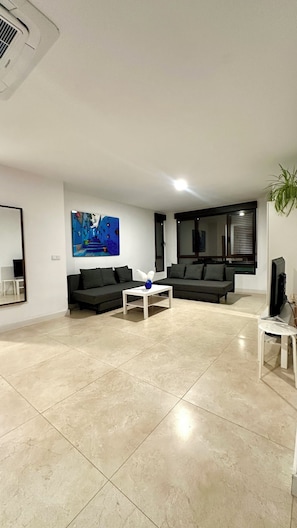 Apartamento, 2 quartos | Sala de estar