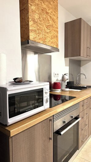 Apartamento, 2 quartos | Micro-ondas