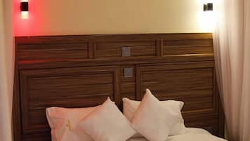 Quarto casal luxo, vista para a cidade | Wi-Fi de cortesia, roupa de cama
