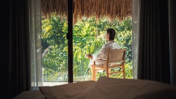 Suite de Luxo, vista para o jardim | Vista do quarto
