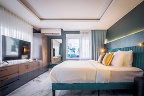 Apartamento, 1 cama King e sofá-cama, para não fumantes, cozinha | Cortinas blackout, ferros/tábuas de passar roupa, Wi-Fi de cortesia