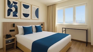Quarto casal ou duplo luxo, vista para o mar | Cofres nos quartos, escrivaninha, espaço de trabalho para notebook