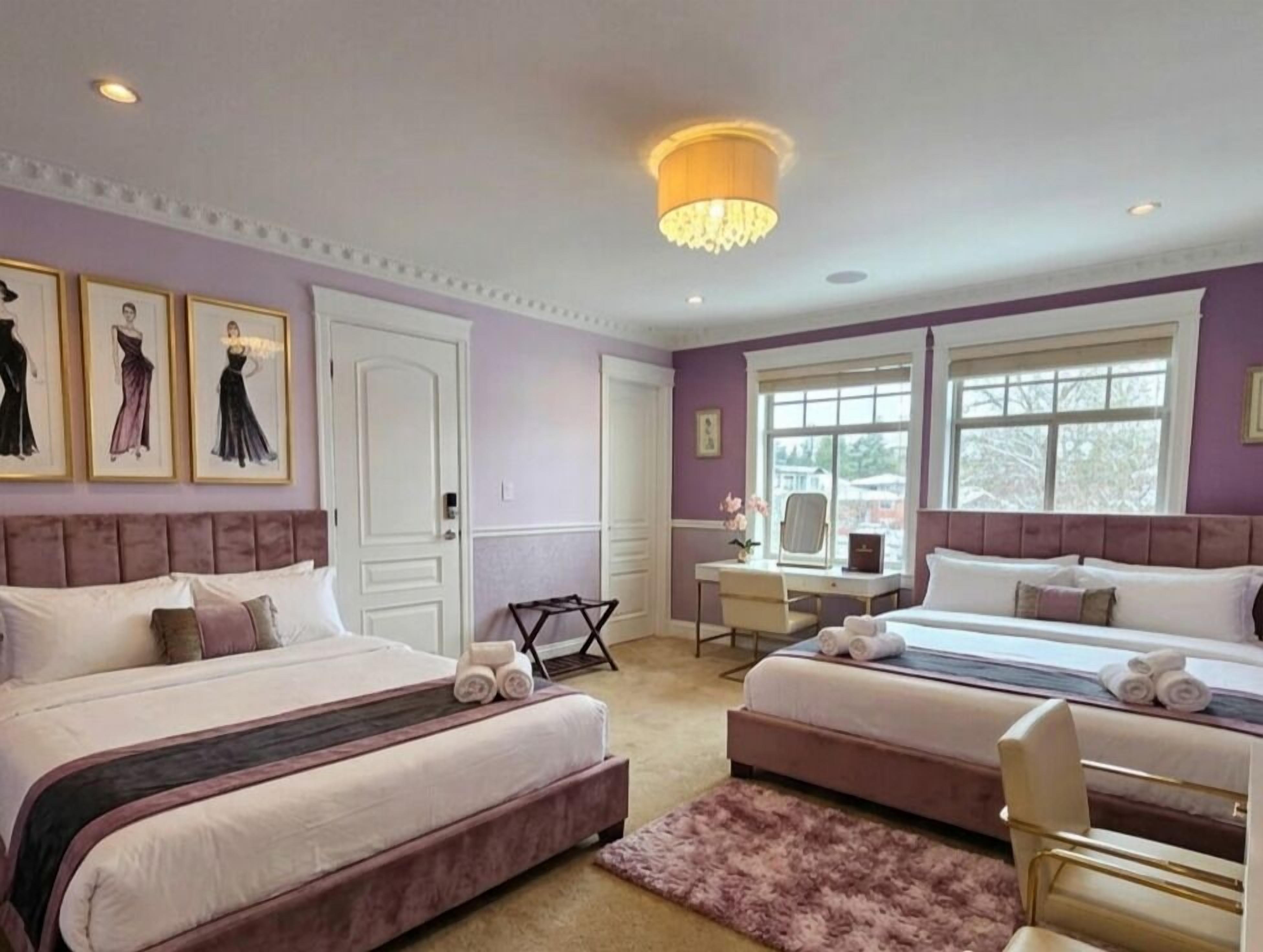 Suíte elite, várias camas, ar-condicionado, no andar executivo | Individualmente decorados, individualmente mobiliados, escrivaninha