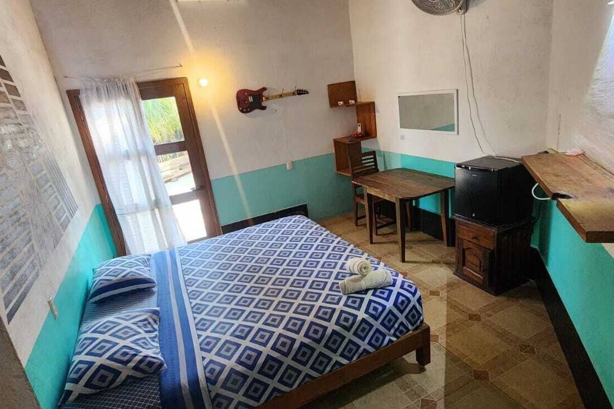 Quarto Duplo Comfort, pátio, vista para o jardim | Minibar, Wi-fi grátis