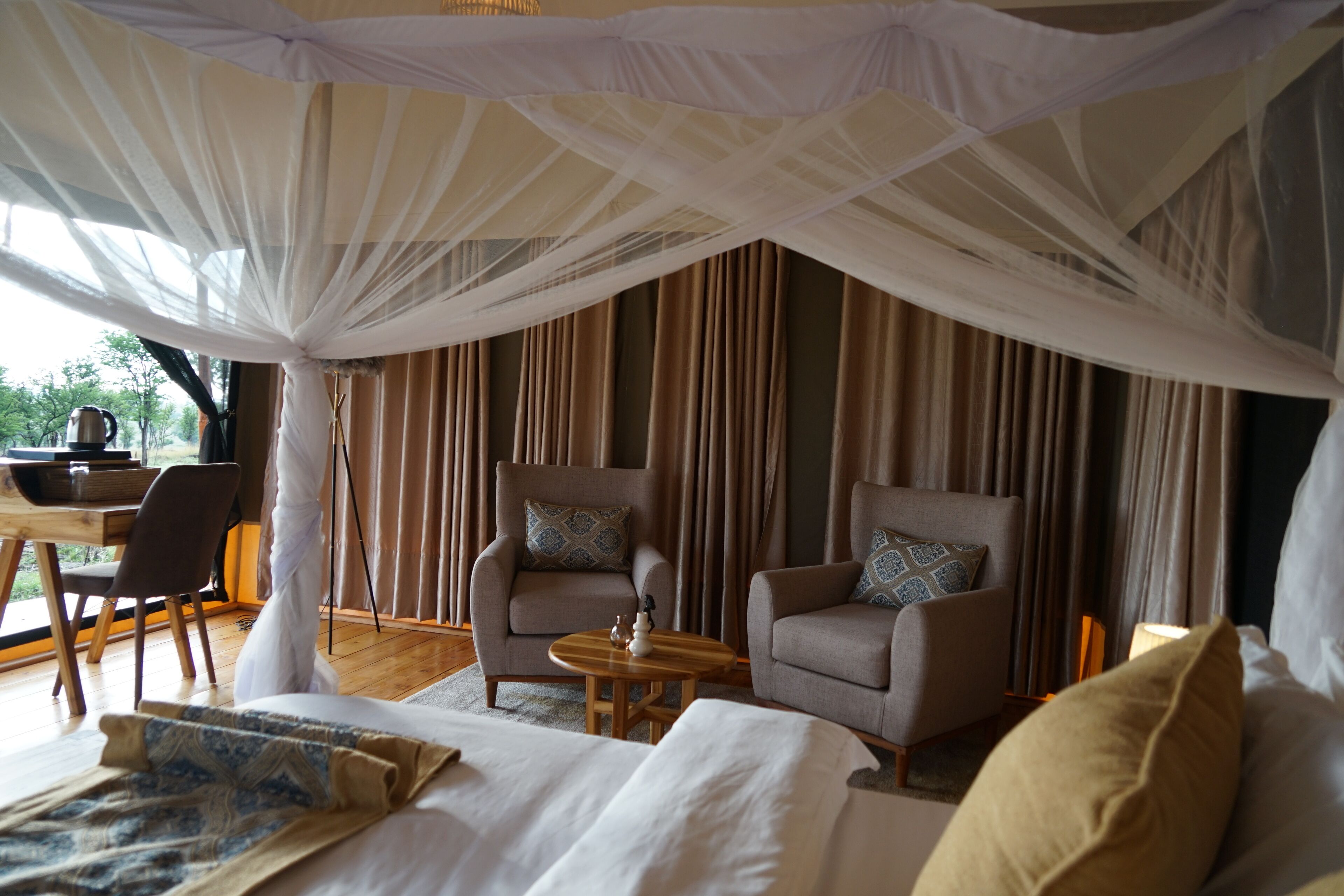 Quarto exclusivo, vista para o parque | Área de estar