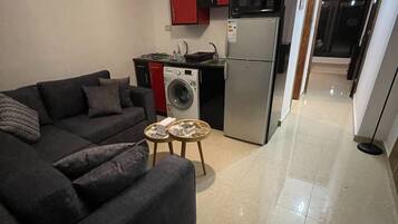 Apartamento, 1 quarto, acessível | Sala