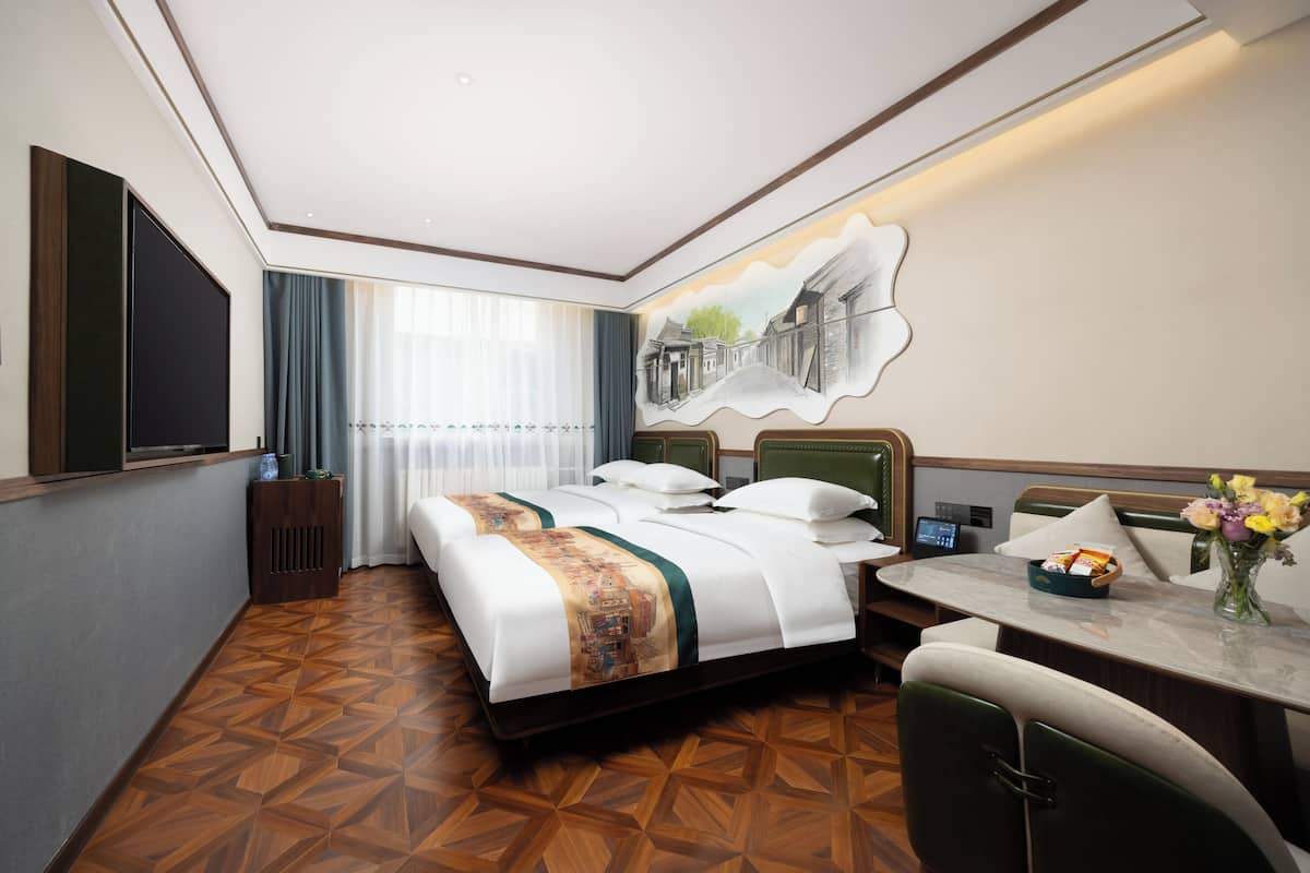 Quarto Duplo ou Twin Familiar | Roupa de alta qualidade, camas de colchão pillowtop, minibar grátis